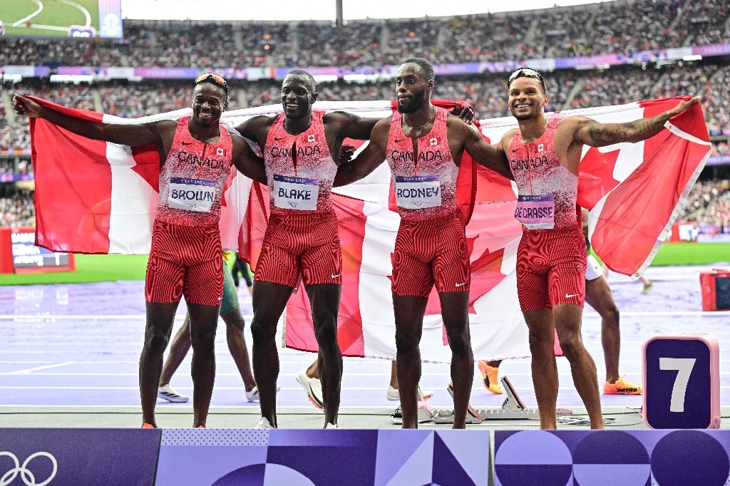 La Jornada - Canadá se lleva el oro en relevo masculino 4x100